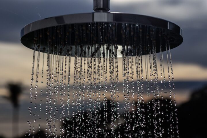 4 Reasons Water Keeps Pooling In Your Shower (And How To Stop It!) - At ...
