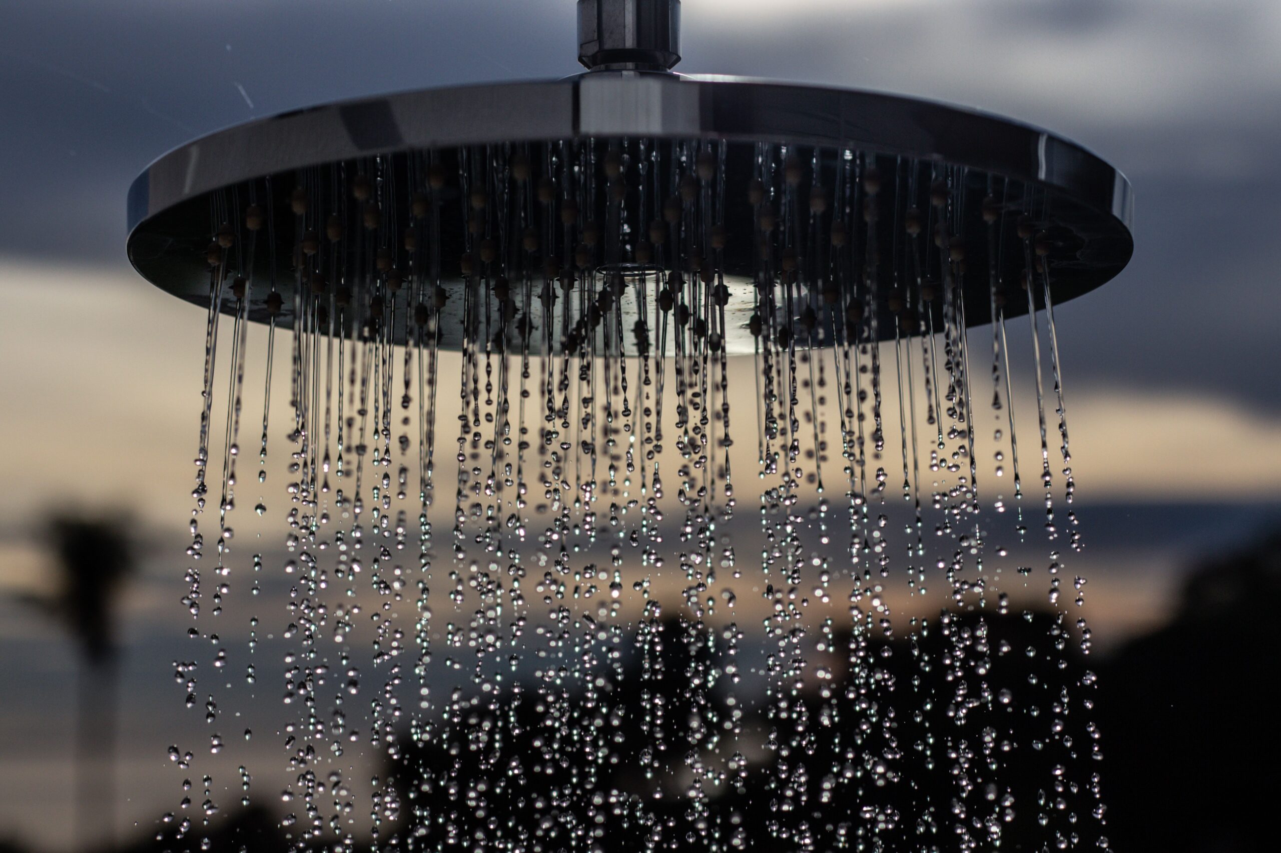 4 Reasons Water Keeps Pooling In Your Shower (And How To Stop It!) - At ...